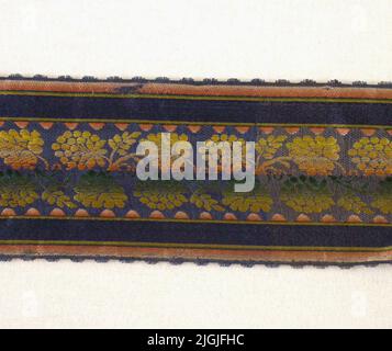 Blue and yellow silk ribbon tied on a metal tube. Ukrainian flag symbol ...