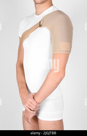 Shoulder trauma fracture, pain. Wearing arm sling after injury. High ...