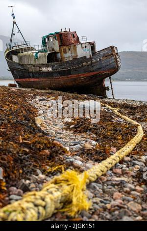 The shipwrecked Old Boat of Caol on the shore of Loch Linnhe near Fort ...