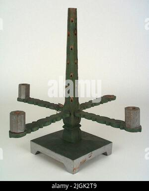 Julträd Christmas tree of wood. Three legs, four light arms. The ...