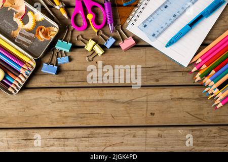 Composition of diverse school tools on wooden surface Stock Photo - Alamy
