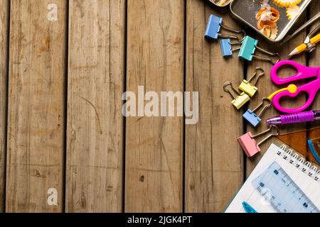 Composition of diverse school tools on wooden surface Stock Photo - Alamy