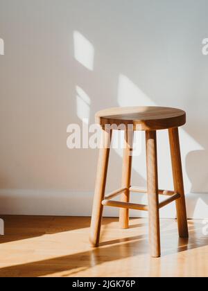 Stool and shadows Stock Photo - Alamy