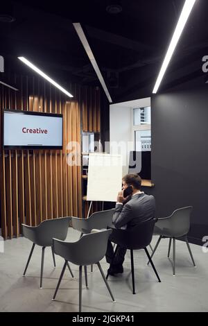 Rear view of a businessman with inscription Stock Photo - Alamy