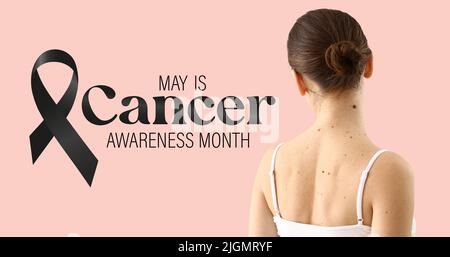 Black ribbon and text MAY IS CANCER AWARENESS MONTH on light blue ...