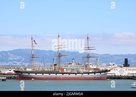 Cargo ships sail in and out of Qingdao Port via the Jiaozhou Bay ...