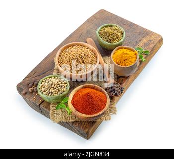 Various spices on white wooden background Stock Photo - Alamy