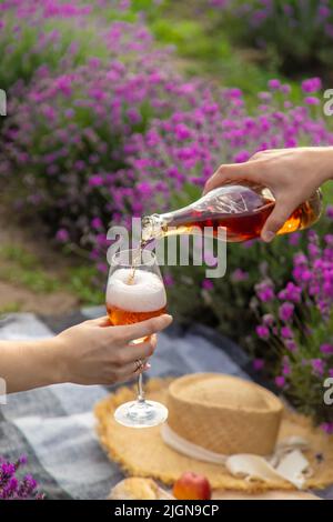 the girl is resting in the lavender field. selective focus Stock Photo ...