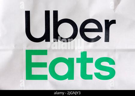 Uber Eats paper delivery bag on dining table Stock Photo - Alamy