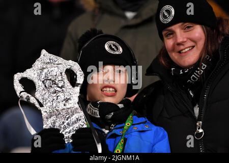 A Boreham Wood fan holds up a replica FA Cup at full time - AFC ...