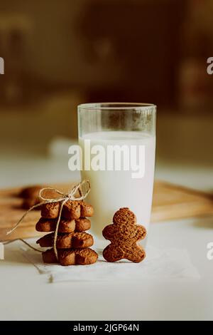 Homemade gingerbread man cookies and milk, traditionally made at ...