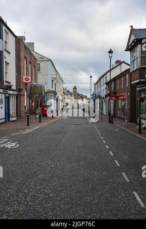 Holywell, UK: Jun 19, 2022: A group of wheelie bins stand along the ...