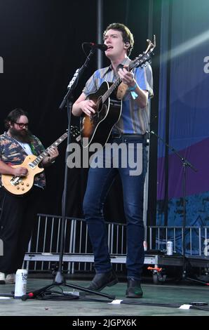 Singer and guitarist Mason Via is shown performing on stage during a ...