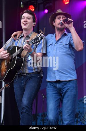 Old Crow Medicine Show band members are shown performing on stage ...