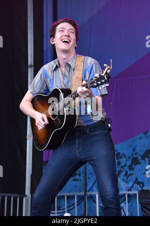 Singer and guitarist Mason Via is shown performing on stage during a ...
