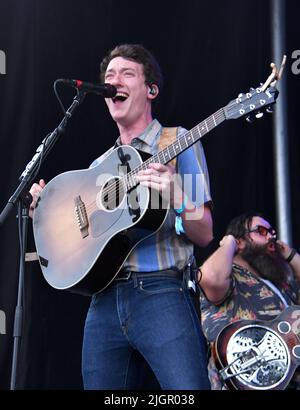 Singer and guitarist Mason Via is shown performing on stage during a ...
