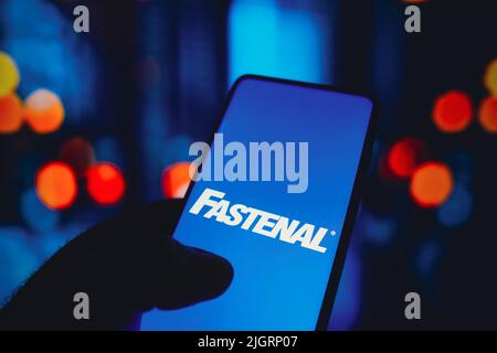 In this photo illustration, the Fastenal logo is seen on a smartphone ...