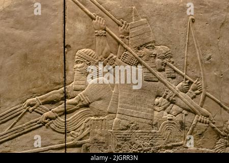 Assyrian reliefs displayed at the British Museum in London, England ...
