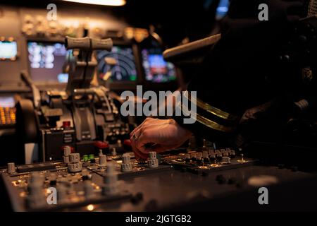 Aircrew copilot using power radar on dashboard to fly aircraft jet ...