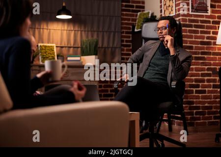 African american counselor thinking of solution to solve relationship ...
