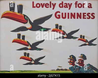 Irish pub with Guinness ad poster in both Gaelic and English, Kilkenny ...