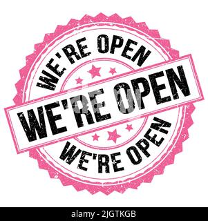 WE'RE OPEN text written on pink-black lines stamp sign Stock Photo - Alamy