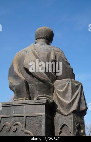 A bronze statue of a sitting Ogahiy, famous writer and critic. At ...