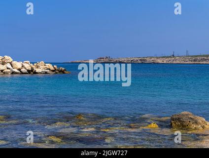 Seashore with blue water, North Governorate, Anfeh, Lebanon Stock Photo ...