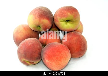 Fresh peaches on bright background. Selective focus Stock Photo - Alamy