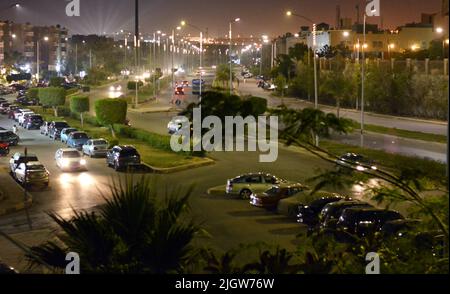 Giza, Egypt, May 19 2022: the moving vehicles and cars at night on the ...