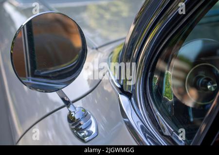 round rear view morror of a classic car Stock Photo - Alamy