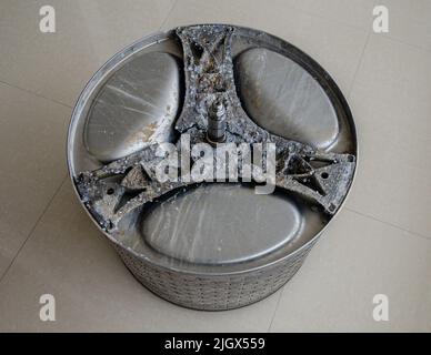 Corroded Aluminium Spider of a washing machine Stock Photo - Alamy