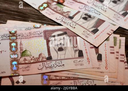Stack of Saudi Arabia 100 SAR one hundred riyals cash money banknote ...