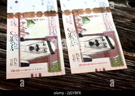 Stack of Saudi Arabia 100 SAR one hundred riyals cash money banknote ...