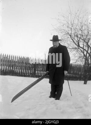 Male with ski, neighborhood Edda, Svartbäcksgatan, Uppsala. Male With ...