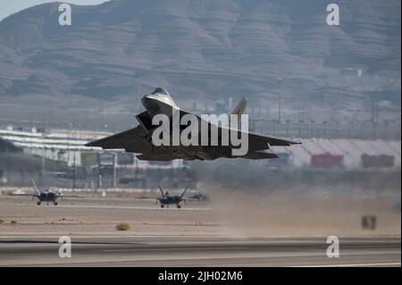 An F-22 Raptor from the 433rd Weapons Squadron, Nellis Air Force Base ...