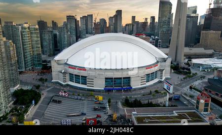 Aerial view of Toronto Rogers Centre at night with people watching ...