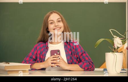 september 1. child typing and texting. sms and instant messaging ...