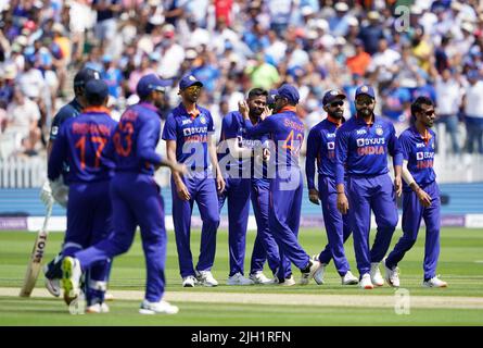 India's Hardik Pandya, centre, celebrates with teammates the wicket of ...