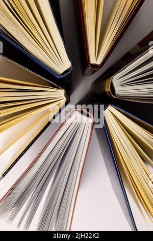 Image of central composition with books standing on white surface Stock ...