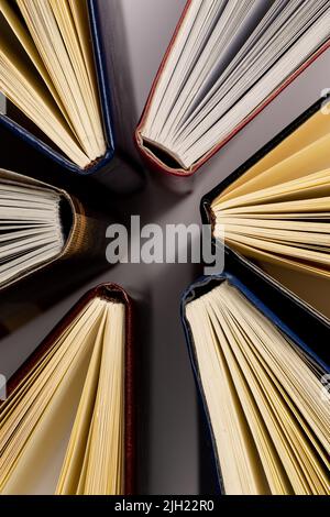 Image of central composition with books standing on white surface Stock ...
