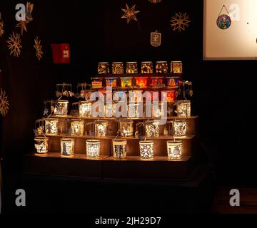 A decorative Christmas display with candle and lights Stock Photo - Alamy