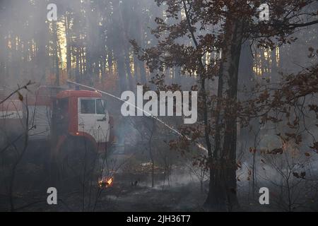 Water cannon of a fire engine shooting a high-velocity stream of water ...