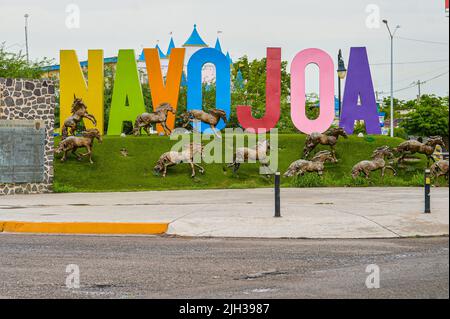 Monumental colored letters and horse stampede sculpture at the entrance ...