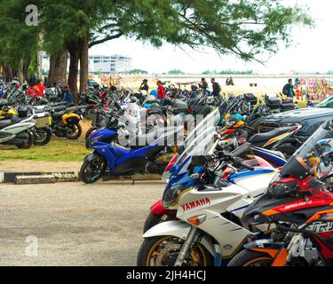 Kuala Terengganu, Malaysia - June 25, 2022: Motorcycle drivers riding ...