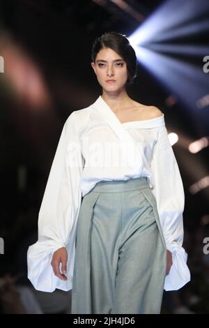 Rome, Italy. 14th July, 2022. Model walks on the catwalk during the ...