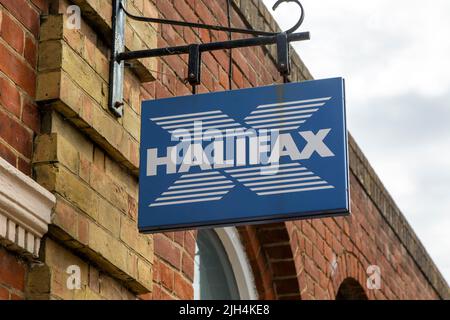 Wall hanging sign for Halifax bank branch on High Street, UK Stock ...