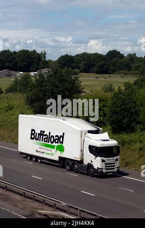 Buffaload lorry on the M40 motorway, Warwickshire, UK Stock Photo - Alamy