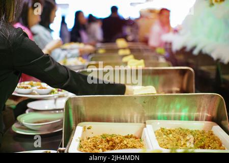 People group grab buffet food in restaurant after seminar Stock Photo ...