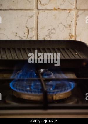 preparing a grill for cooking with heat and olive oil Stock Photo - Alamy